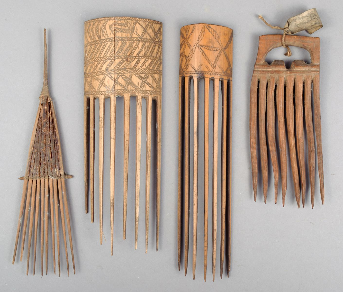 A New Hebrides comb Melanesia wood, with a handwritten label Carved by ...