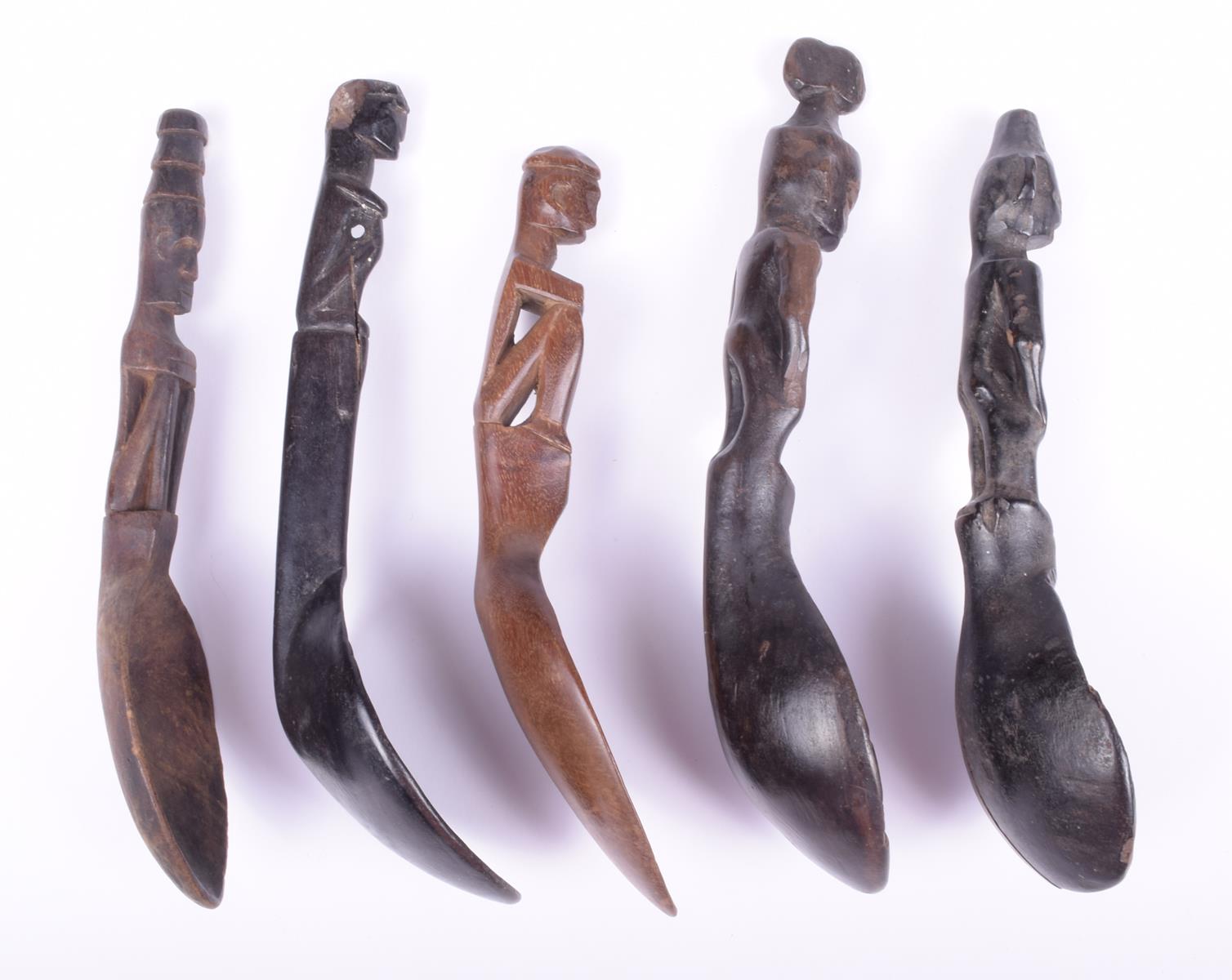 An Ifugao anthropomorphic spoon Philippines wood, carved with a ...