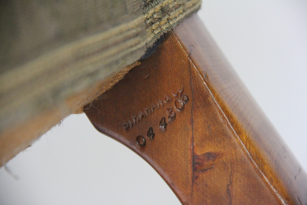 A late 19th century Irish club type chair by Strahan & Co, Dublin, of ...