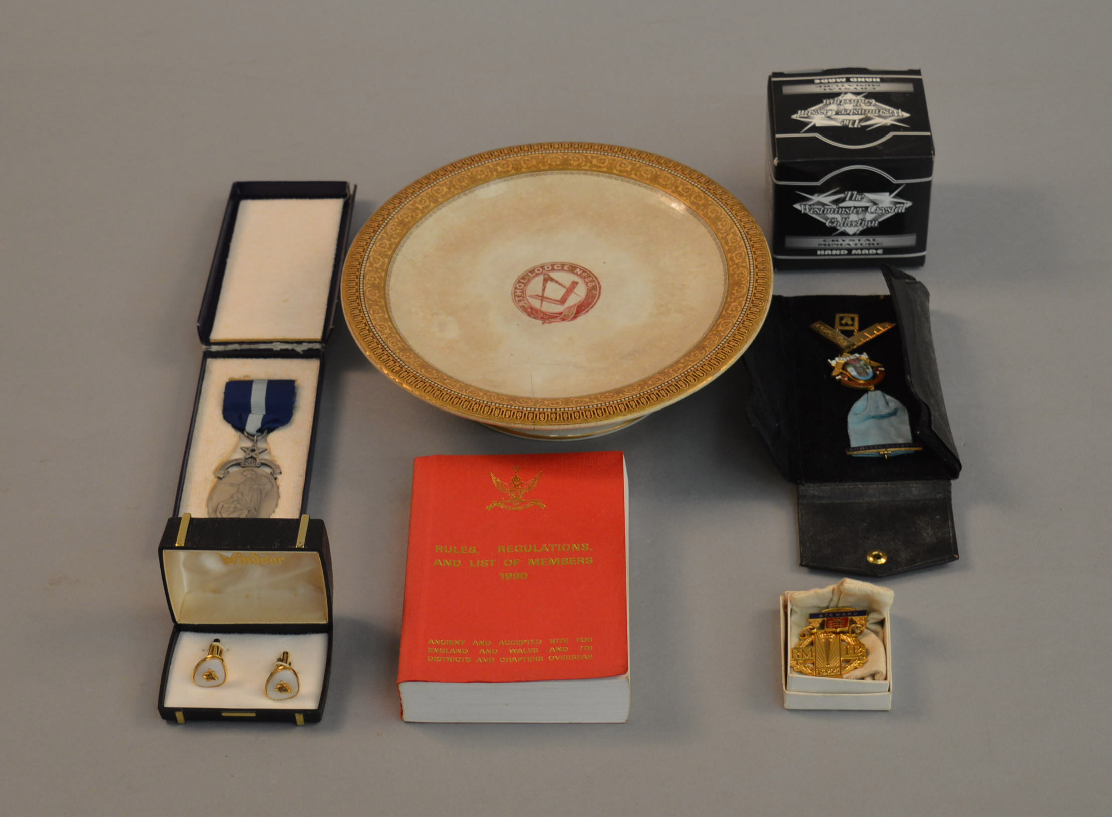 A mixed lot of Masonic memorabilia including a hallmarked silver gilt ...