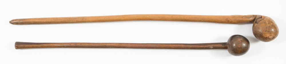 An African root wood knobkerrie and a hardwood knobkerrie (2):.