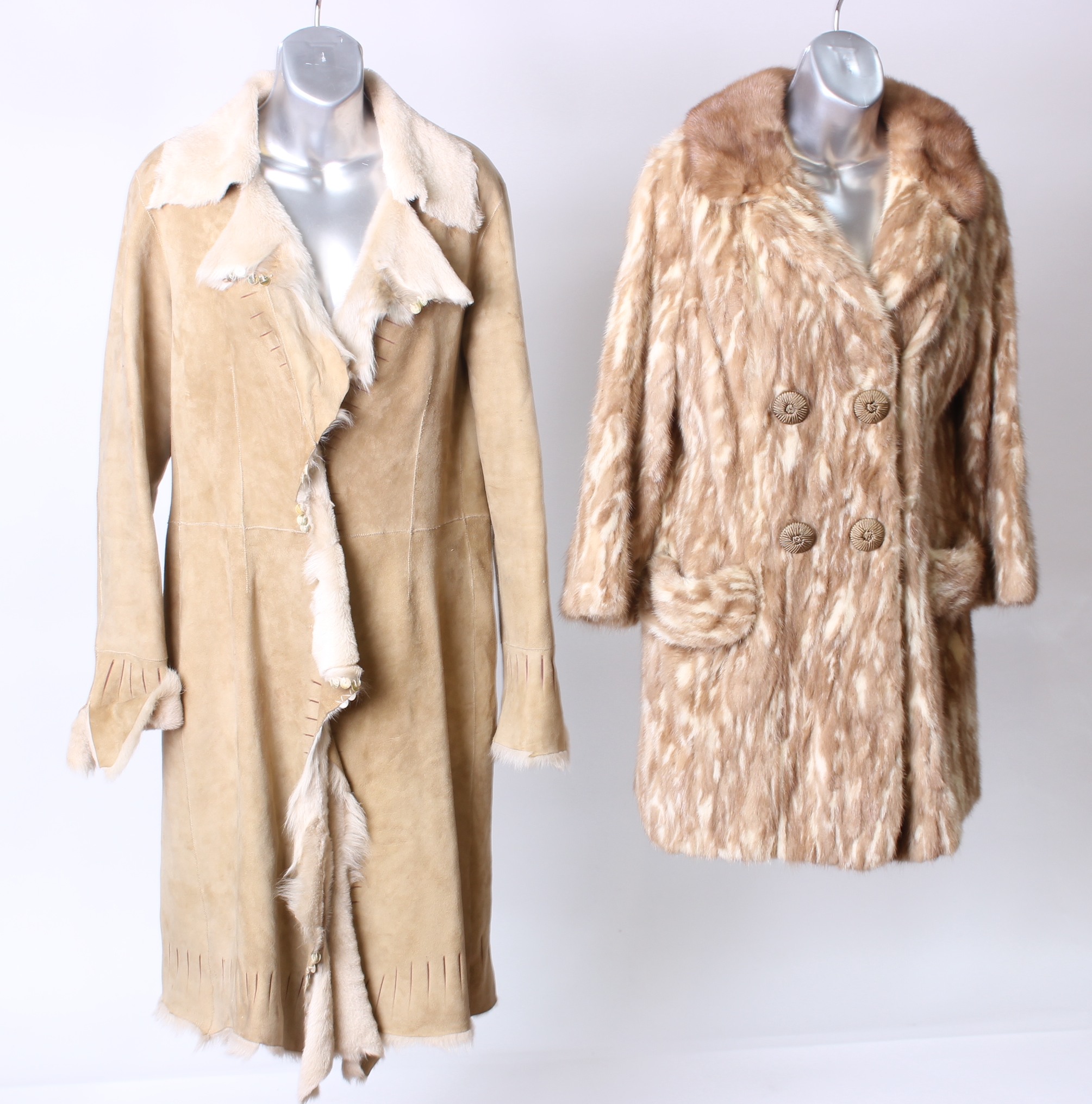 An F K Bauers fawn and cream mottled fur coat with a mink collar; a ...