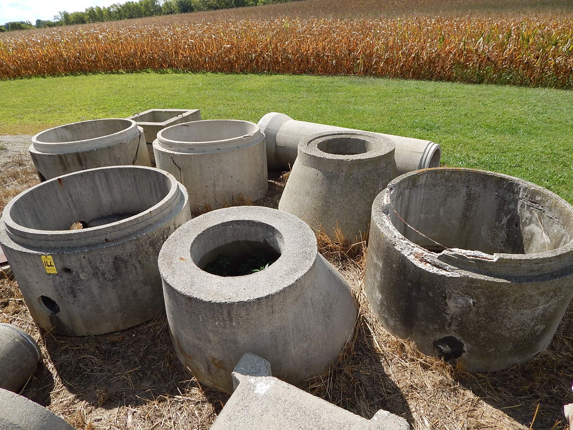{ Group of lots: 164, 165, 166, 167 } } Concrete Manholes, Risers, Pipe