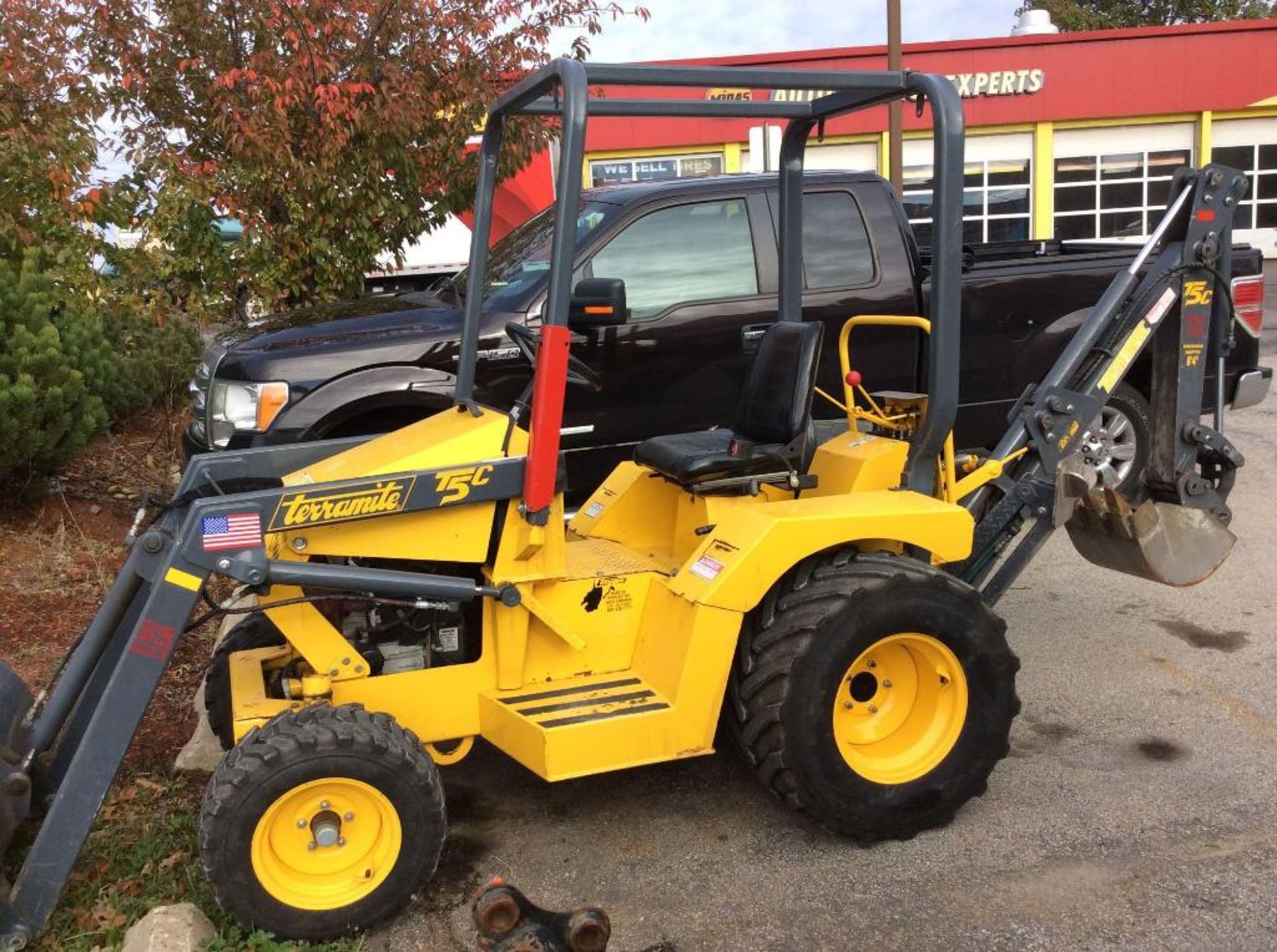 Terramite m/n T5C loader backhoe, s/n 214520309, reading 423 hours, 8'4 ...