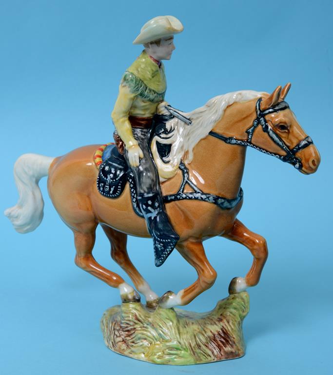 A Beswick Cowboy, 1377, gloss (tail restored) See illustration ...