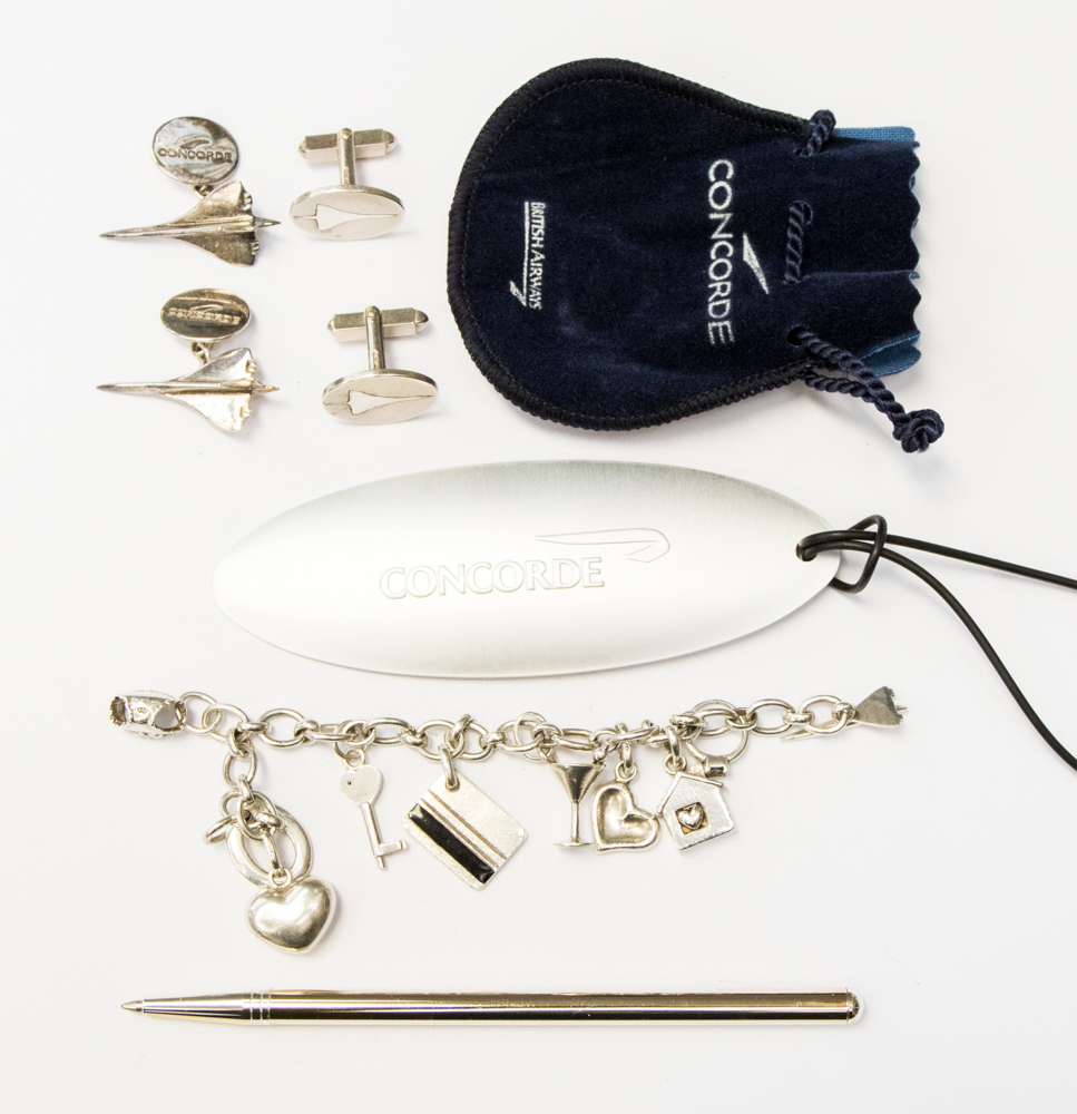 Concorde related collection of silver cufflinks, charm bracelets etc