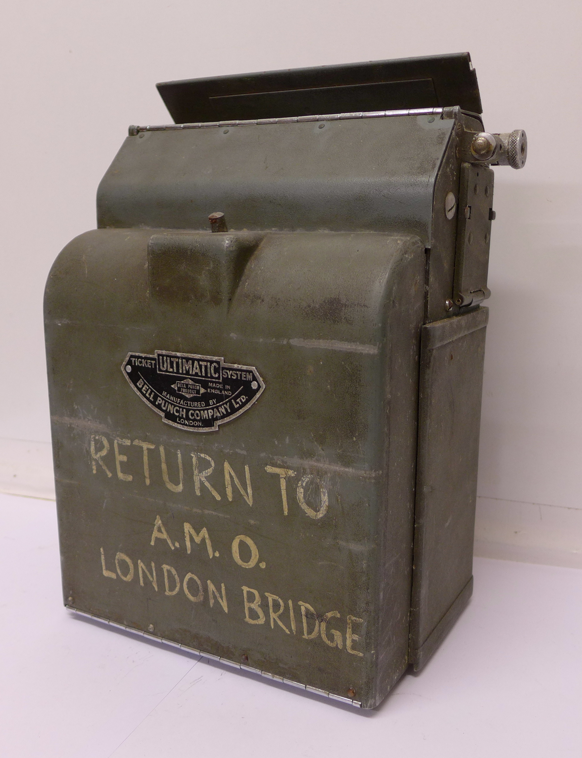 A Bell Punch Company ticket machine, marked Return to A.M.O. London Bridge