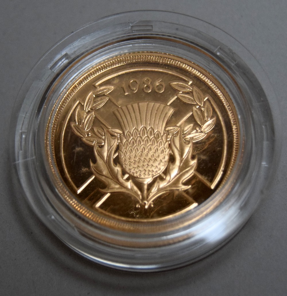 A 22ct gold Royal Mint 1986 Proof Two Pound coin, in original box with ...