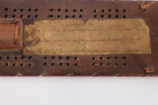 A 19th Century wooden and inlaid ivory Masonic cribbage board decorated ...