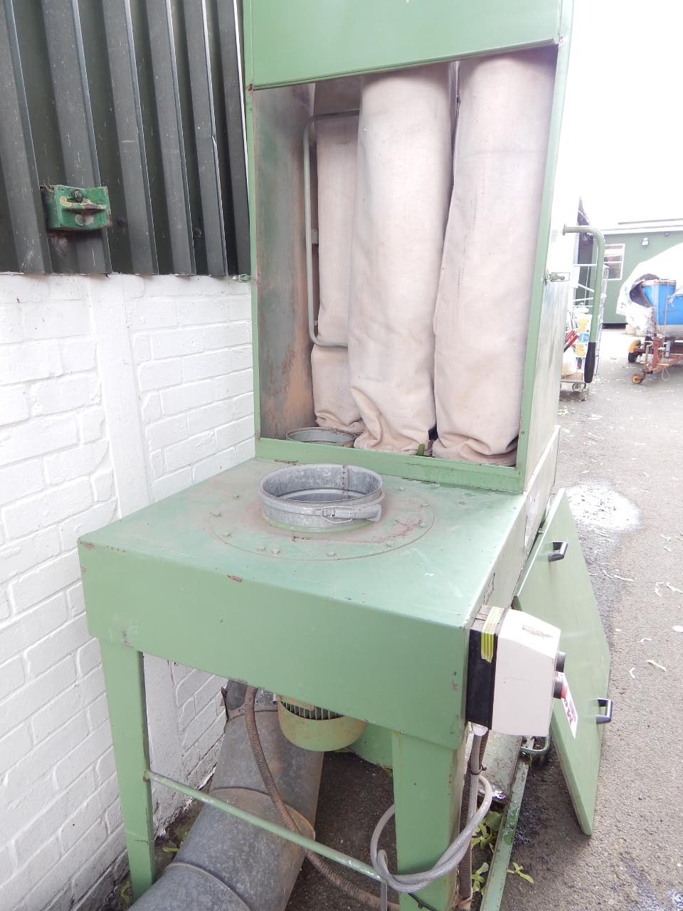 A Mardon Industrial wood dust extractor, green.