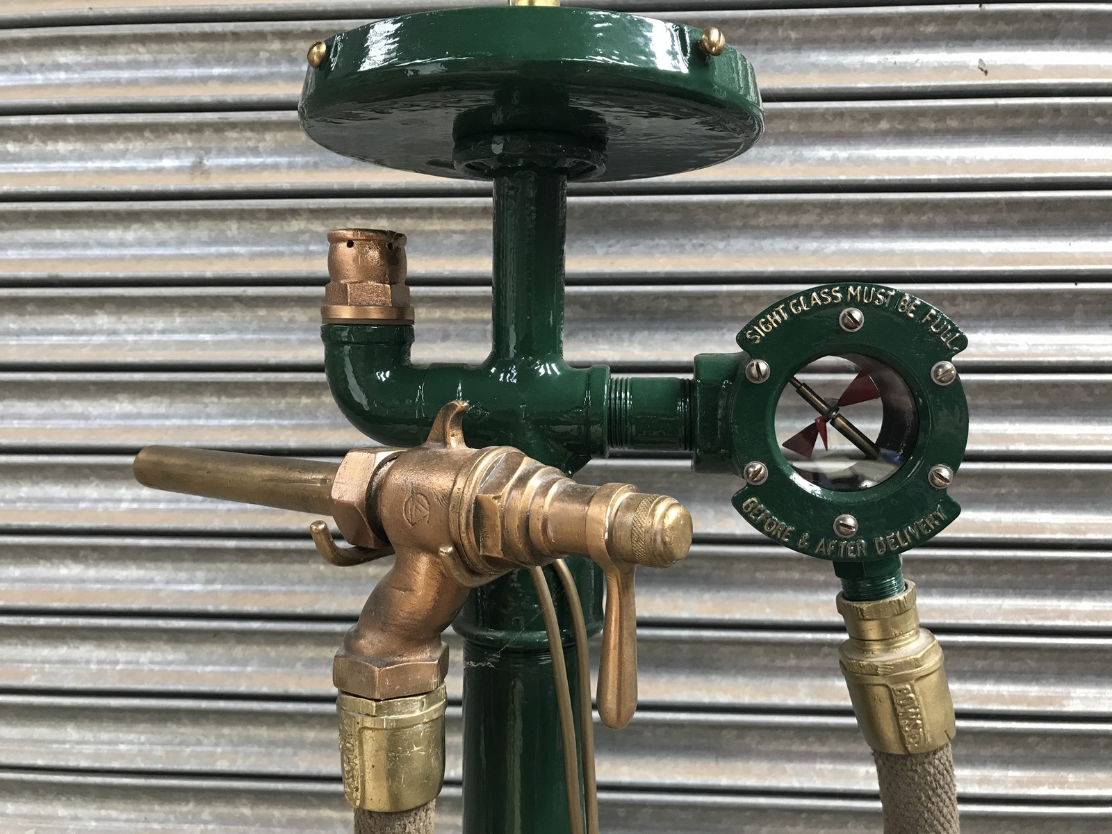 An Avery Hardoll CH1 petrol pump in restored condition with a bronze ...