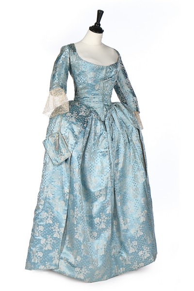 A turquoise-blue brocaded satin robe a l'Anglaise, the silk 1760s, but ...
