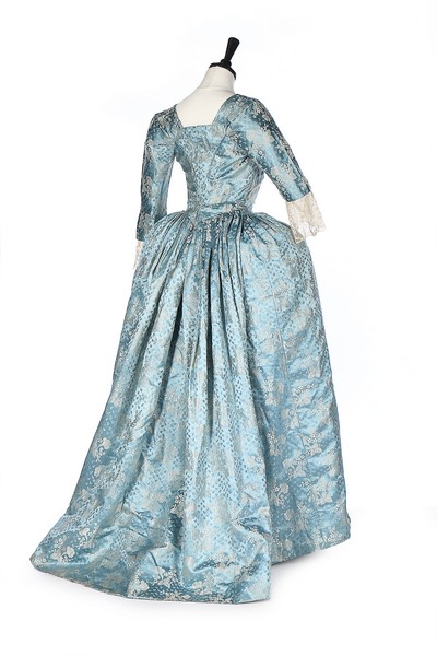 A turquoise-blue brocaded satin robe a l'Anglaise, the silk 1760s, but ...
