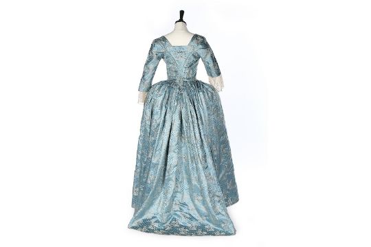 A turquoise-blue brocaded satin robe a l'Anglaise, the silk 1760s, but ...