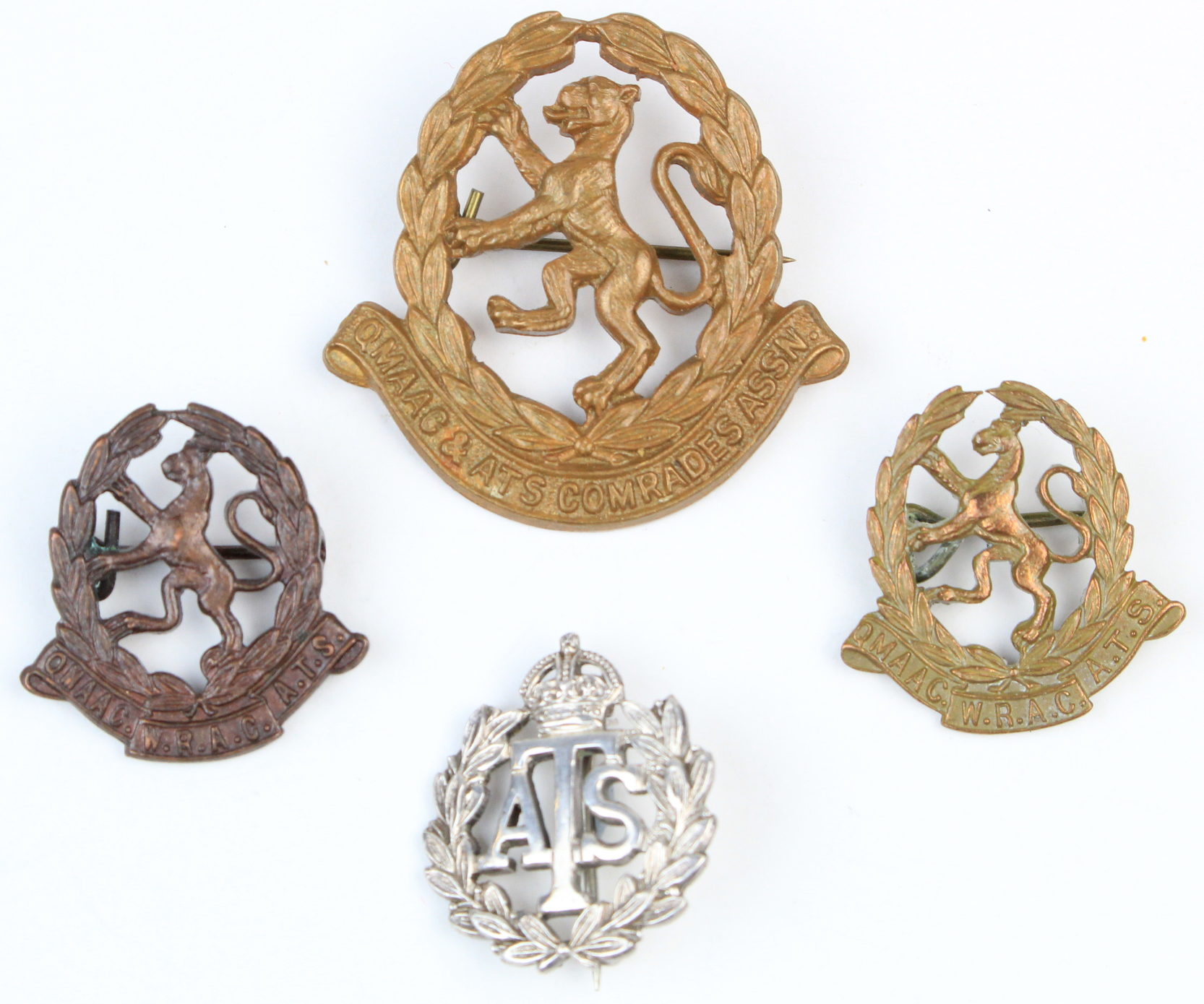 Badges - 4 - comprising a QMAAC and A.T.S. COMRADES ASSN. BADGE, 2 ...
