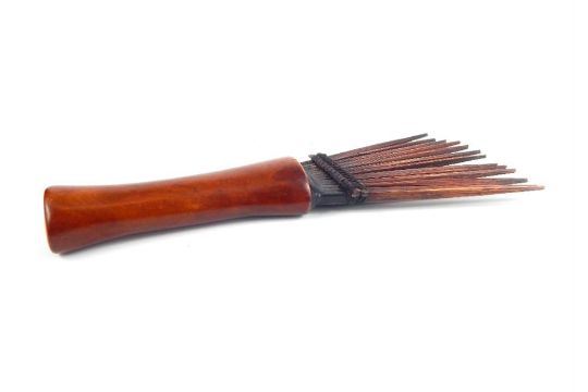 An African or Oceanic tribal comb, with plain mahogany handle, 21cm long.