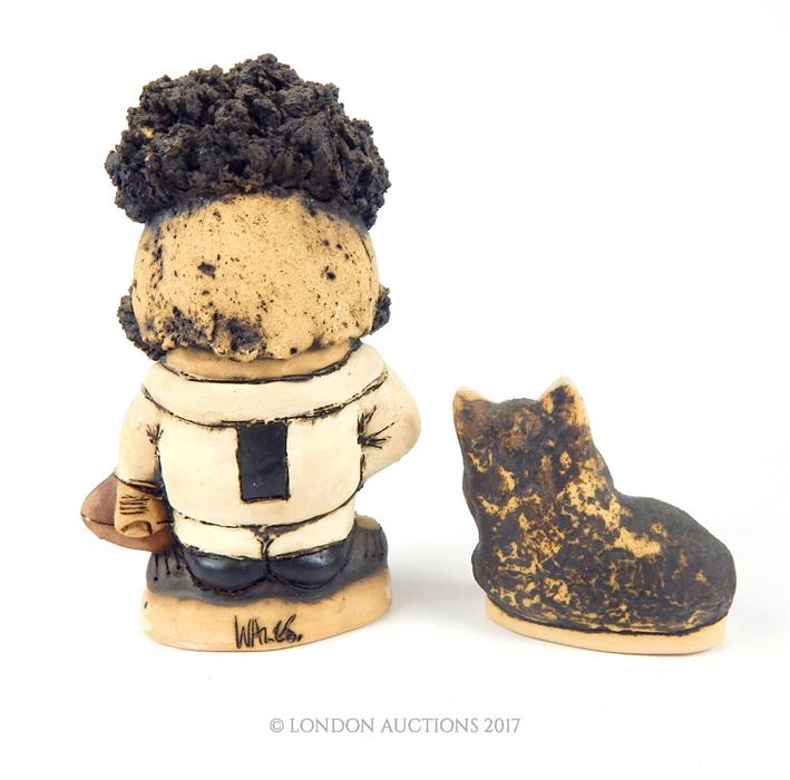 A John Hughes Grogg pottery figure of 'The Best Player in the World ...