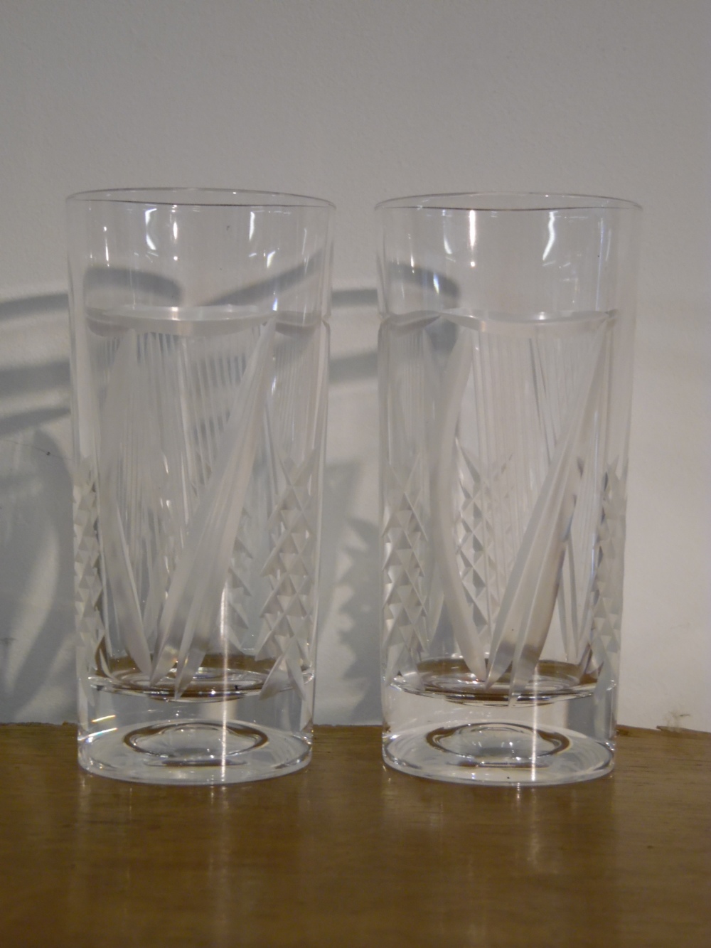 CRYSTAL - A pair of Belfast Crystal 'Harp' pattern glasses.