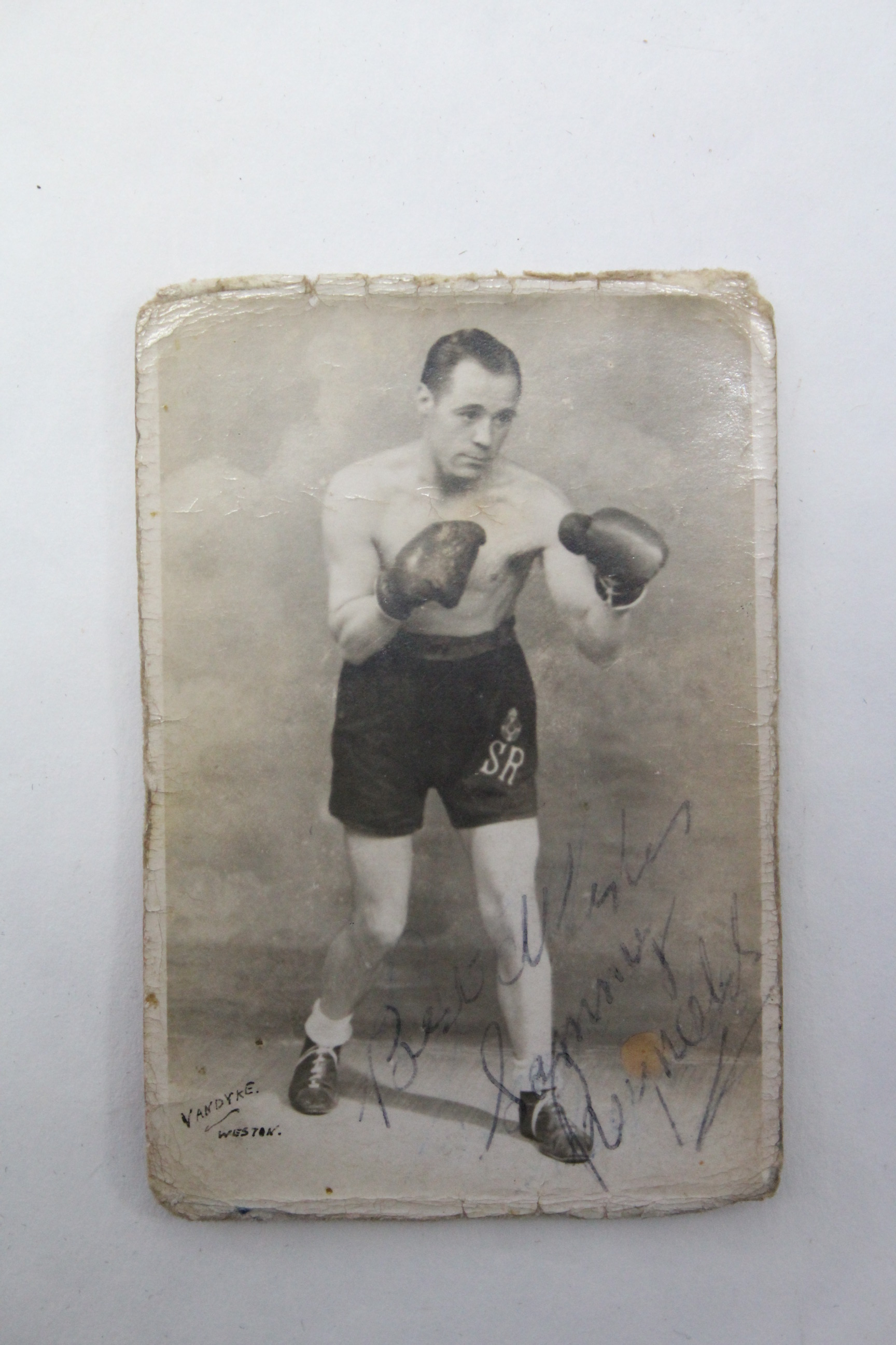 A mid-20th century autographed photograph of the boxer Sammy Reynolds ...