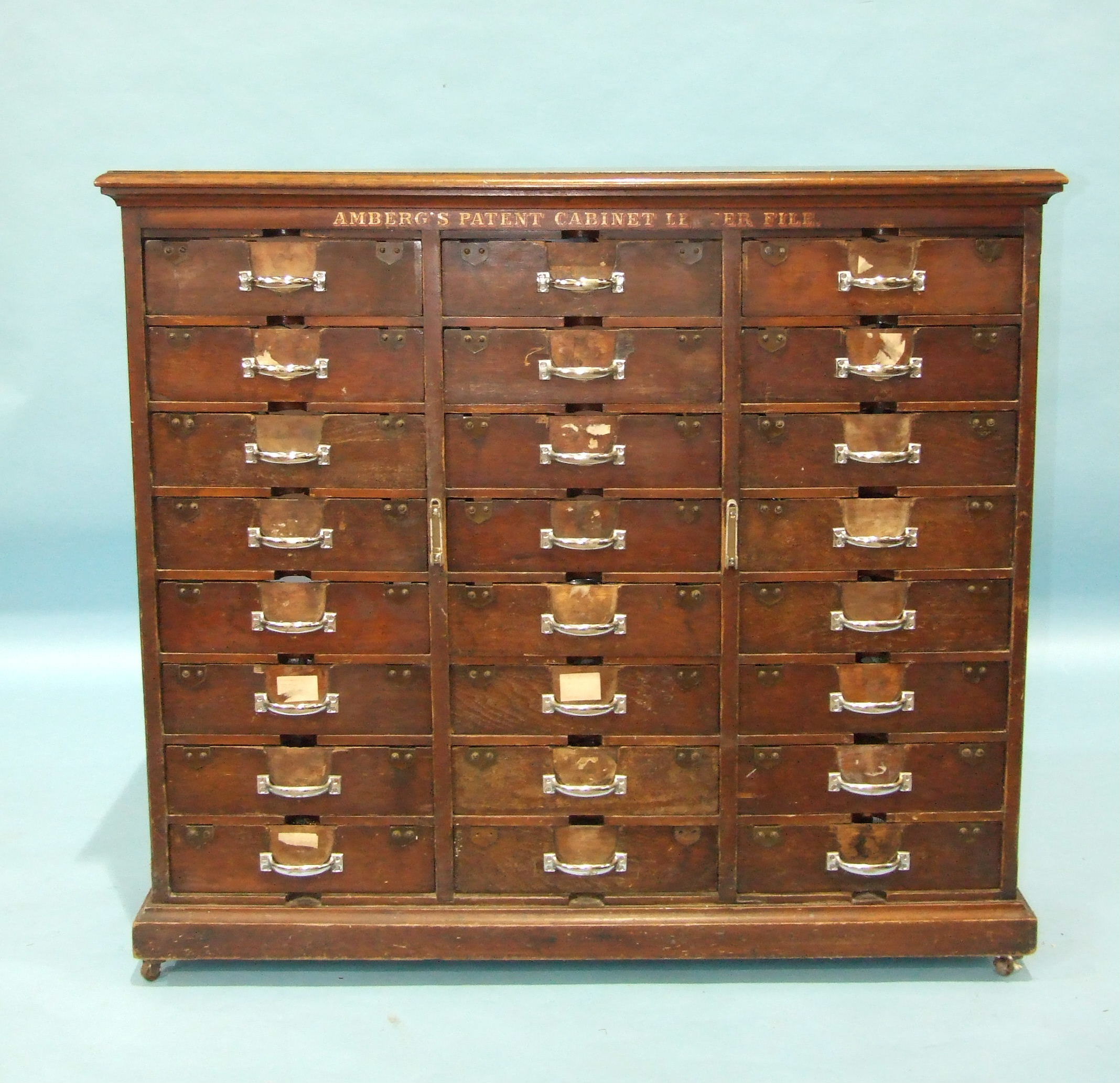 A late-19th century hardwood file cabinet 'Amberg's Patent Cabinet ...