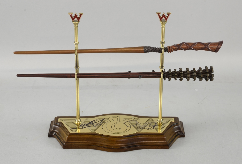Harry Potter A Signed Official Weasley Wand Display With Two Replica