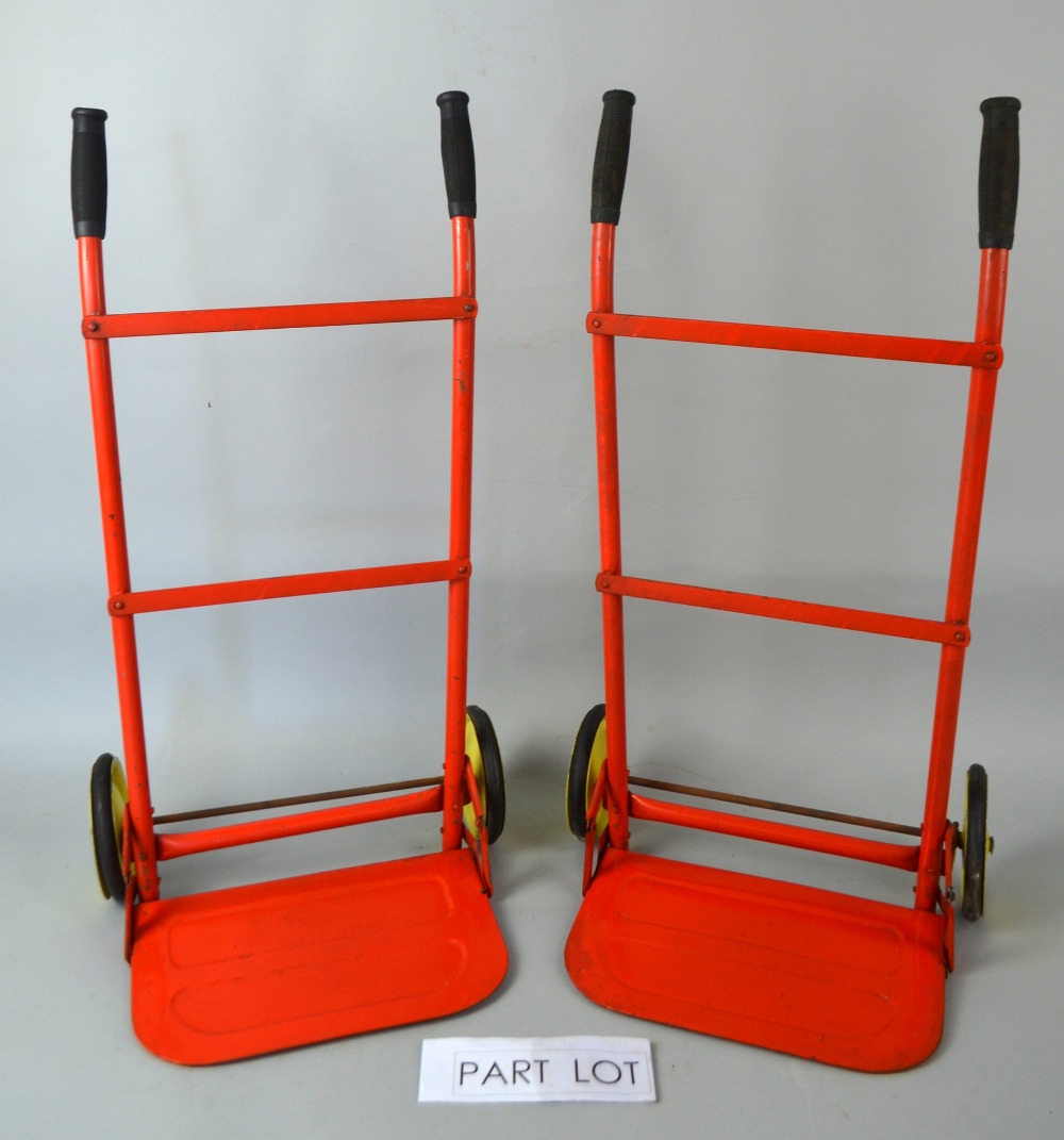 Triang Toys child's metal wheelbarrow and two sack barrows (3)