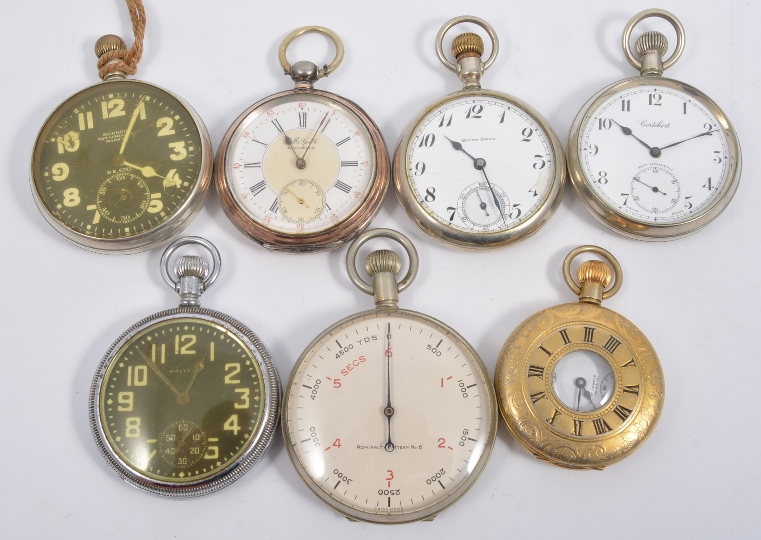 Six pocket watches and a stop watch, An Admiralty Pattern No 6 stop ...