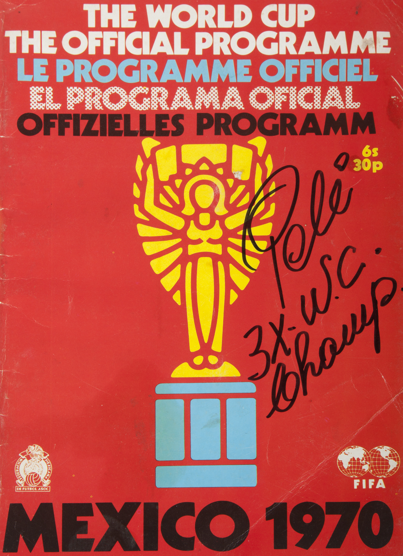 An official program from the 1970 FIFA World Cup signed by Pelé. The ...