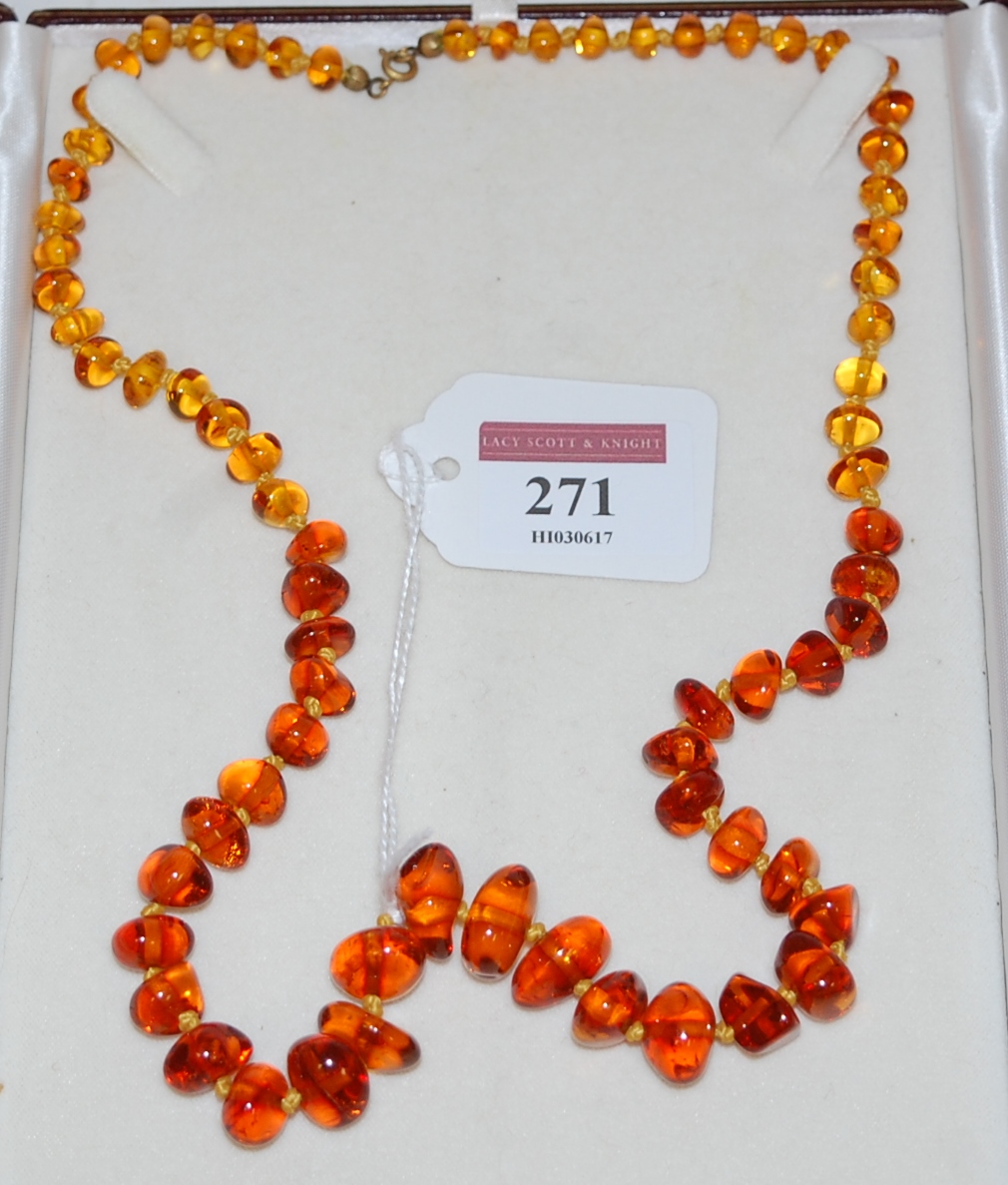 An Amber Shop of Southwold, Suffolk, graduated beaded amber necklace ...