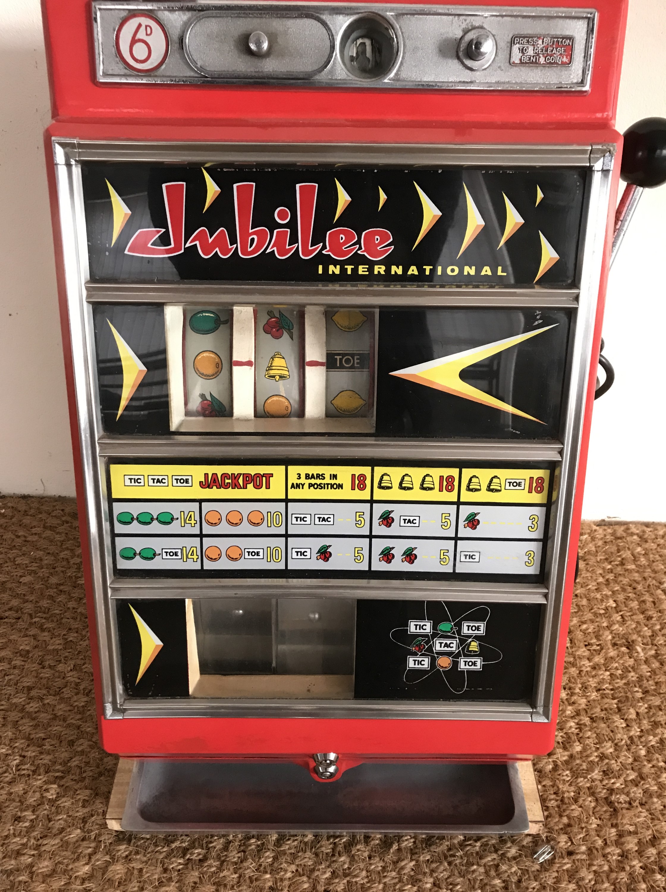 A Jubilee International one armed bandit fruit machine, 66 cm