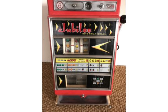 A Jubilee International one armed bandit fruit machine, 66 cm