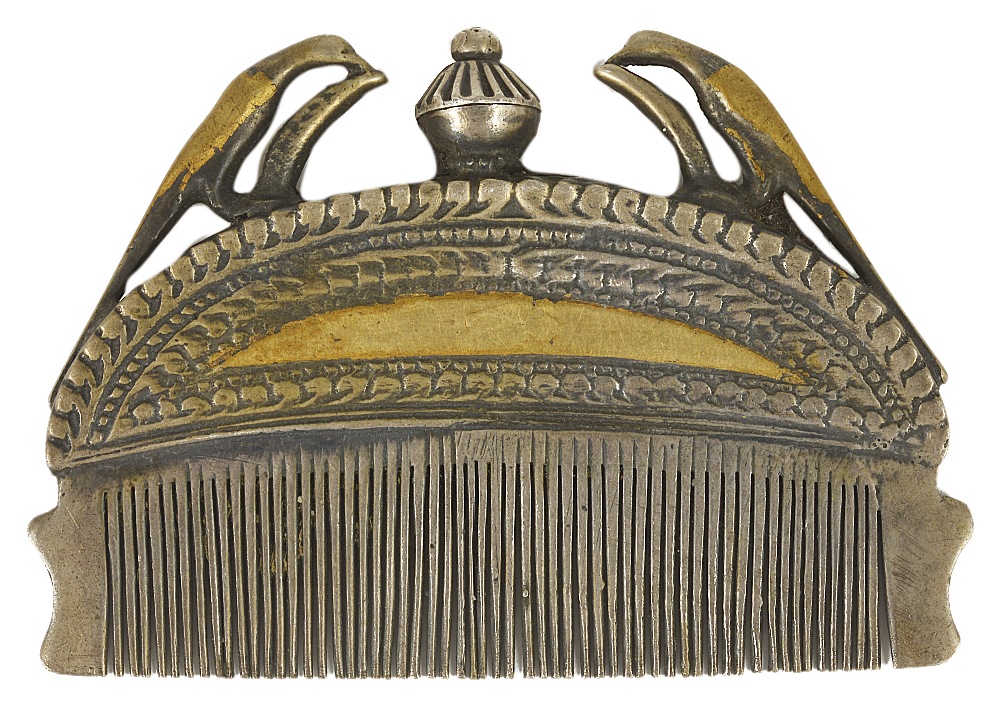 A PARCEL GILT SILVER COMB, INDIA, CIRCA 19TH CENTURY of crescentic form ...