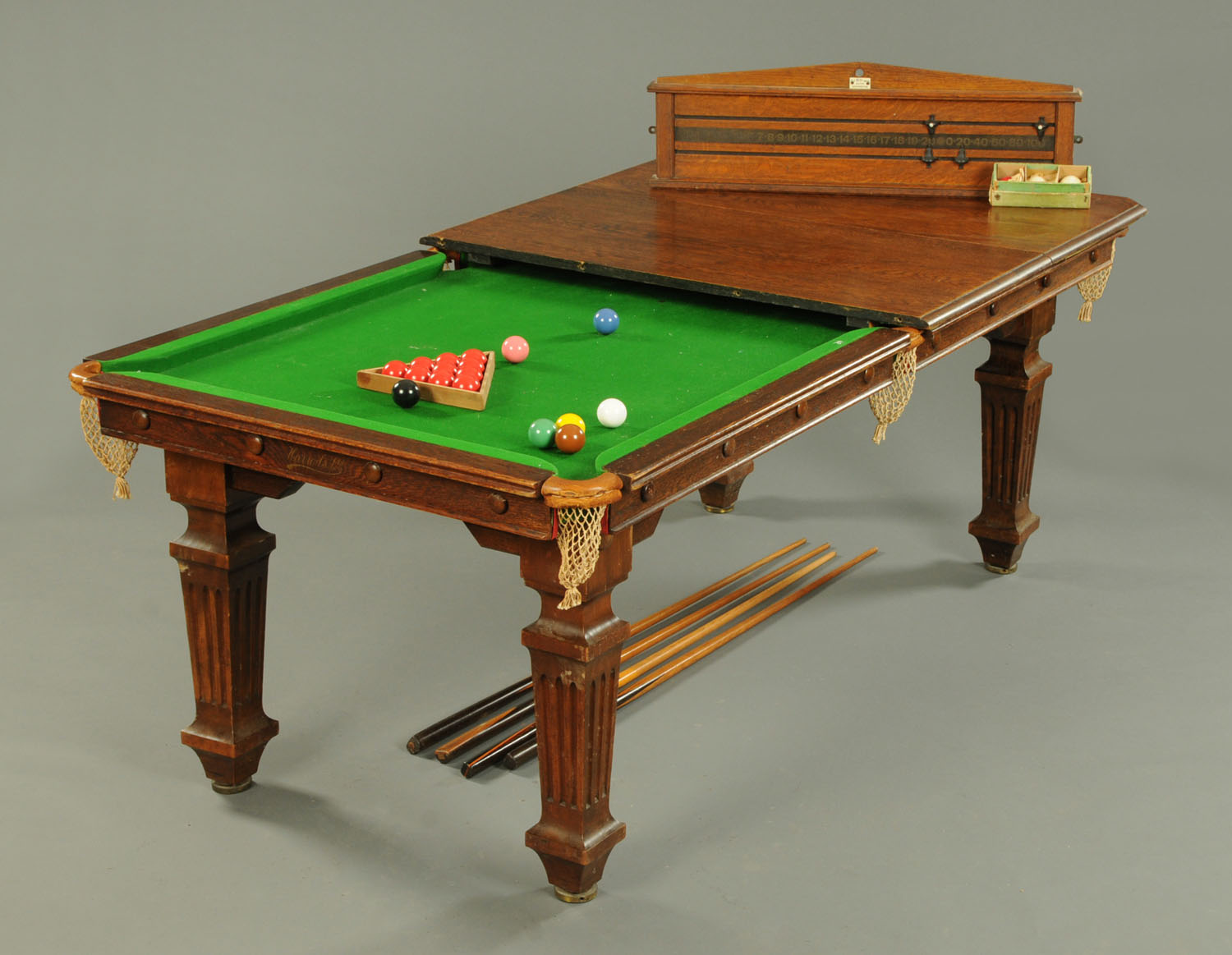 An Edwardian oak combined snooker/dining table supplied by Harrods ...