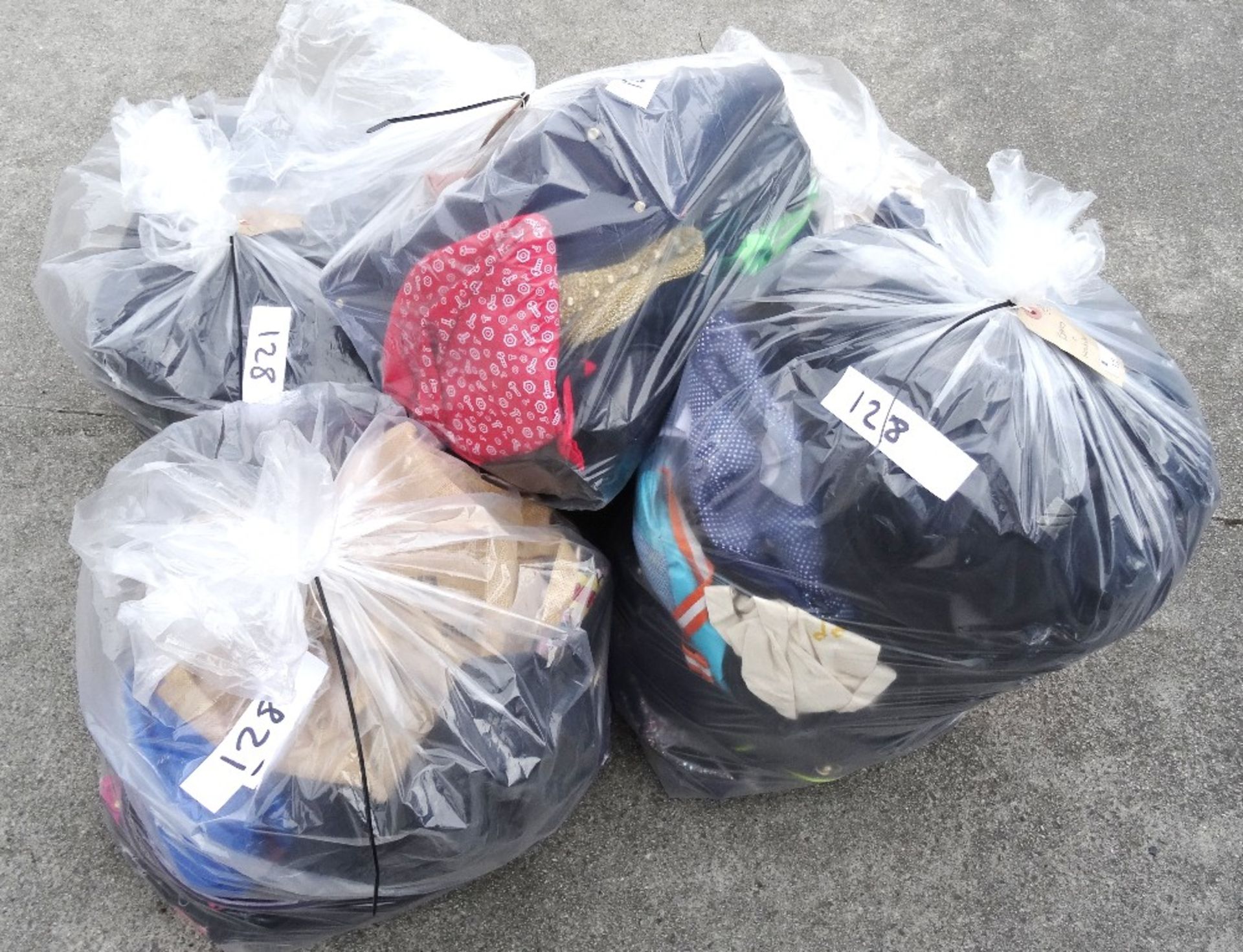 FIVE BAGS OF VARIOUS BAGS including: holdalls; rucksacks; handbags ...