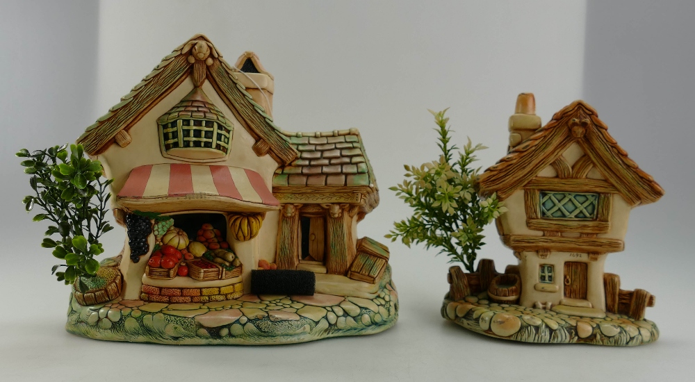 Two large Pendelfin house display stands (2)