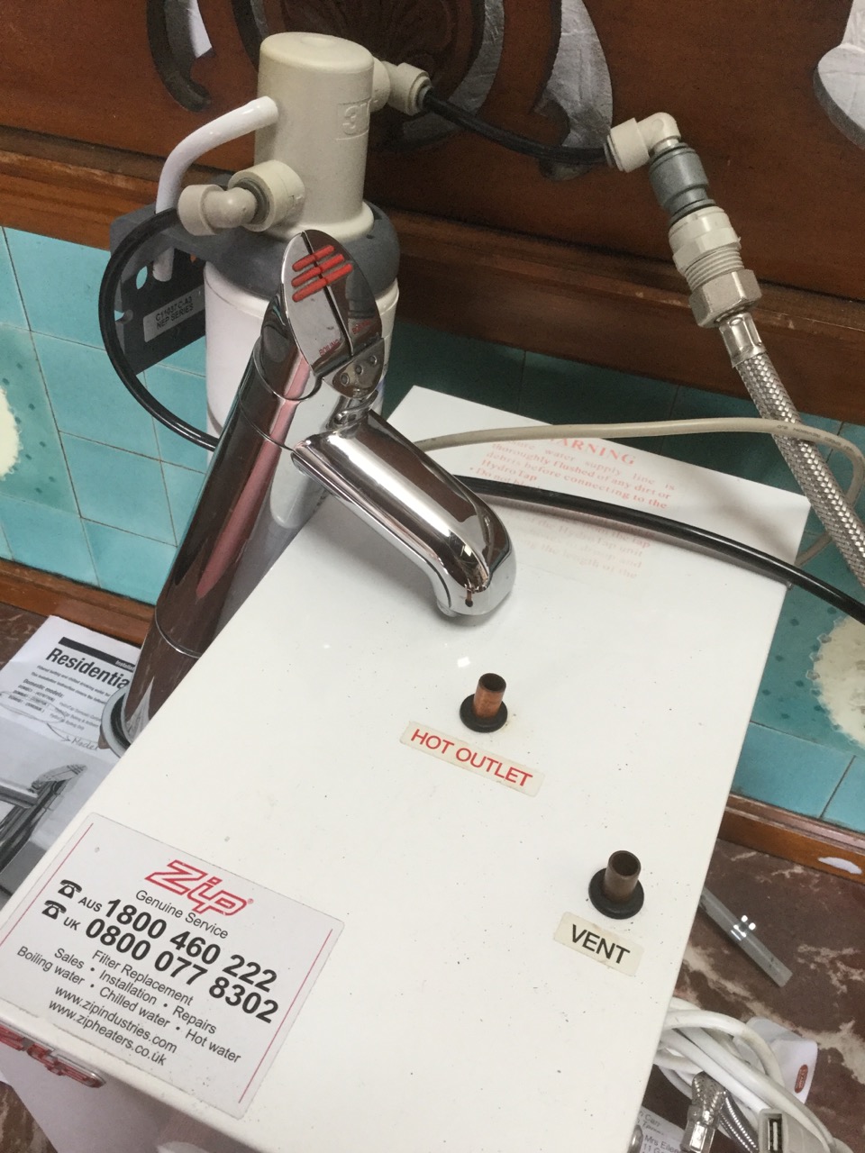 A Zip domestic Hydro Tap, complete with instructions, filtration ...