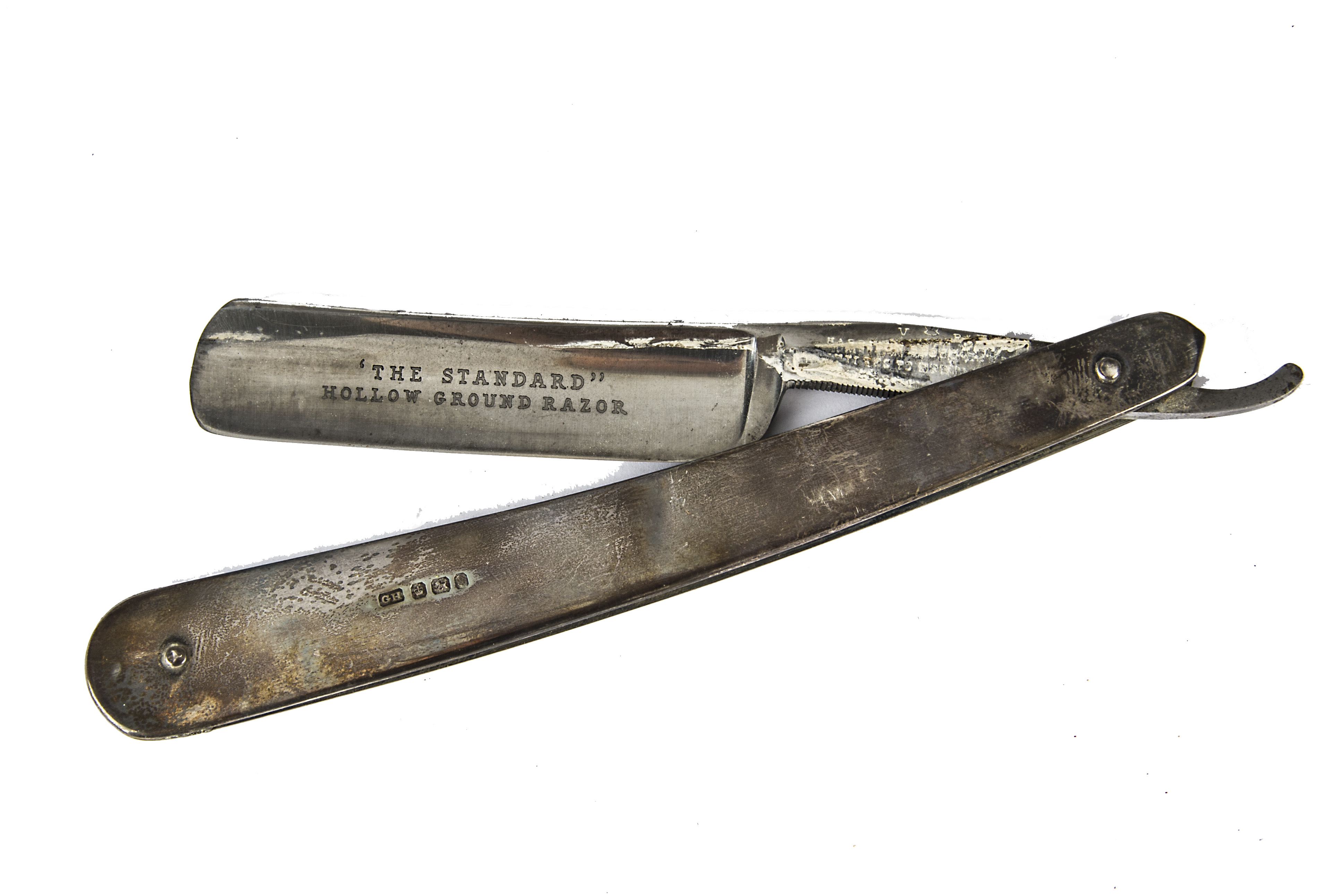 A late Victorian silver handled cut throat razor, dated Sheffield 1897 ...