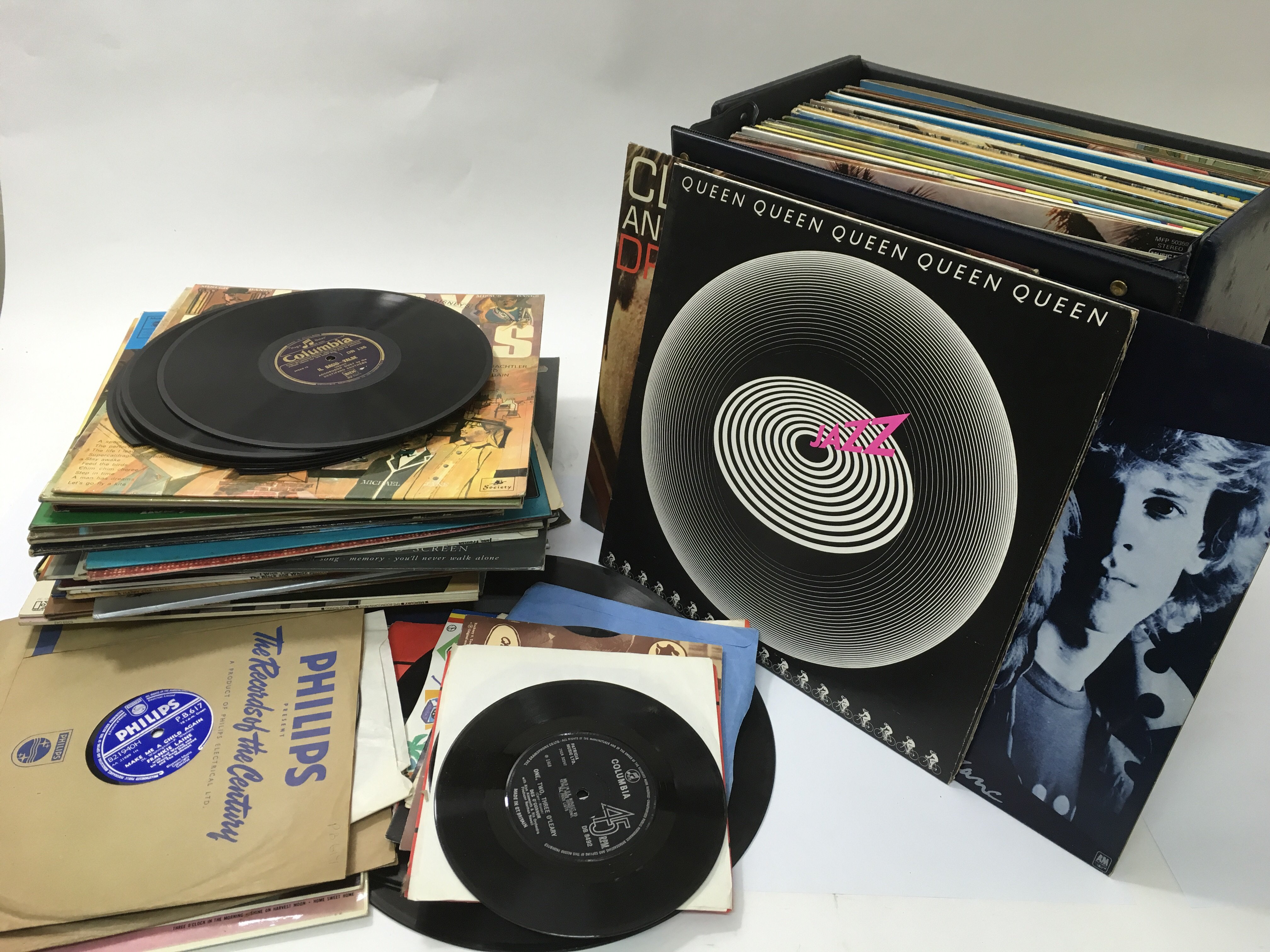 A collection of vinyl records including LPs, 7 inch singles and 78s by ...