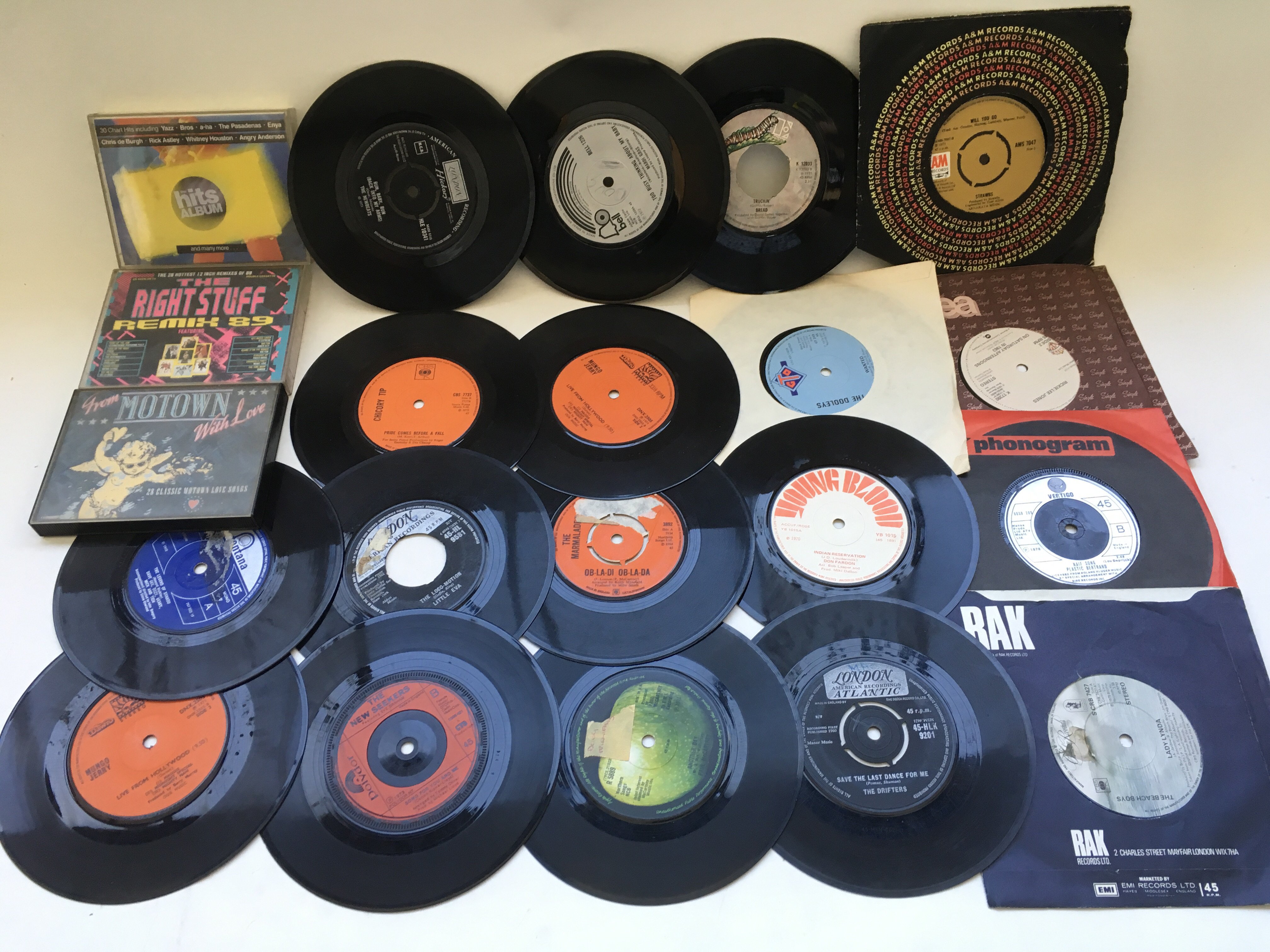 A collection of 7 inch singles and EPs by various artists including The ...