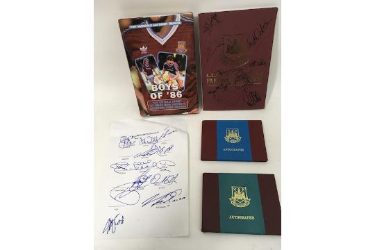 A collection of West Ham United autographs in books and and on ...