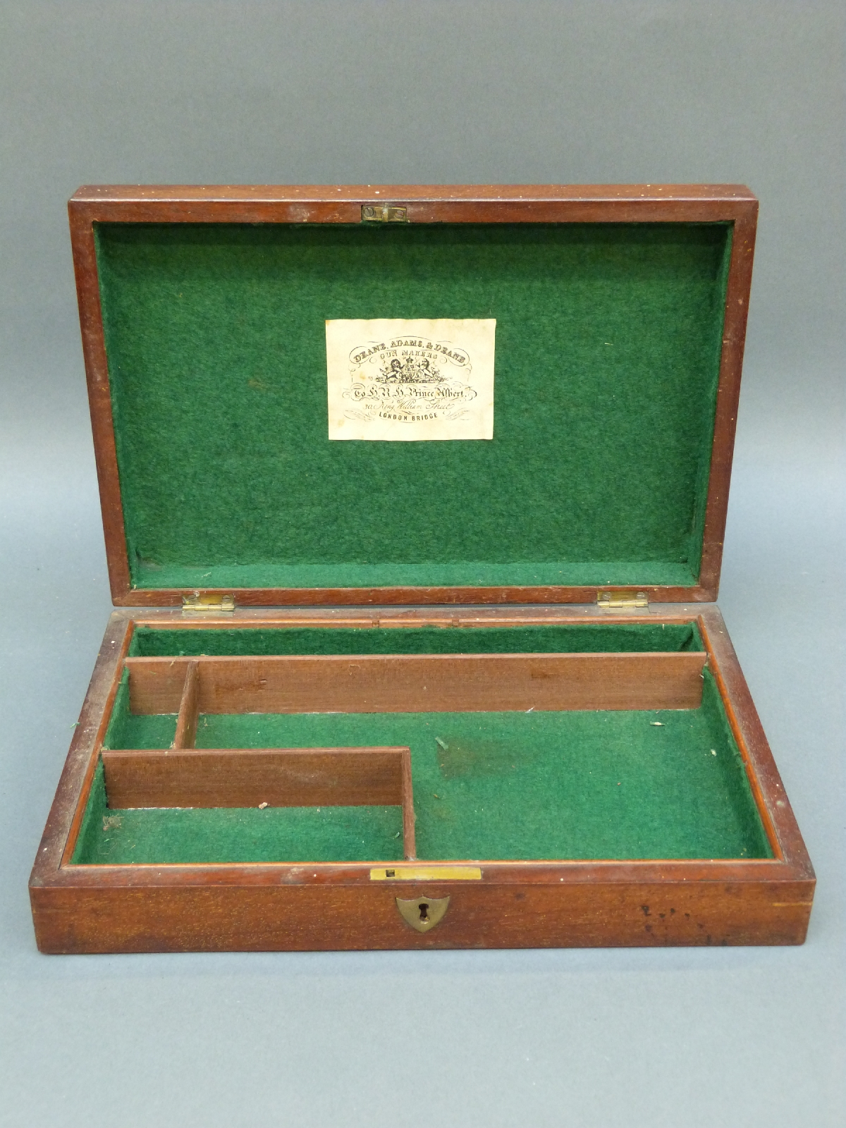 A wooden pistol / revolver box with fitted felt lined interior and ...