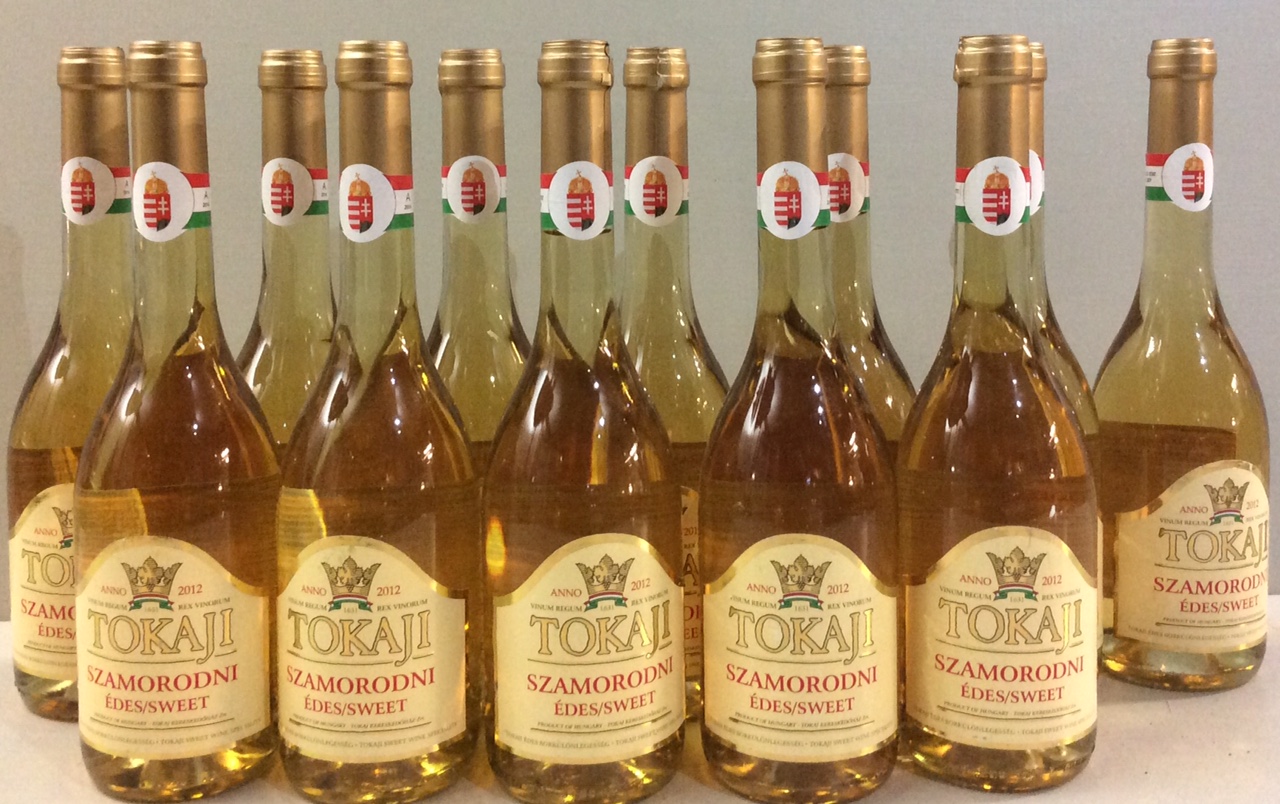 TOKAJI, A DOZEN BOTTLES OF HUNGARIAN SWEET WINE Each bearing a gold ...