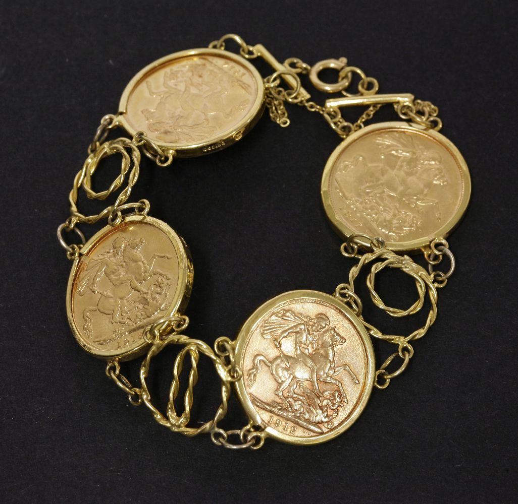 A four sovereign bracelet, the coins dated 1911, 1912, 1913 and 1914 in ...