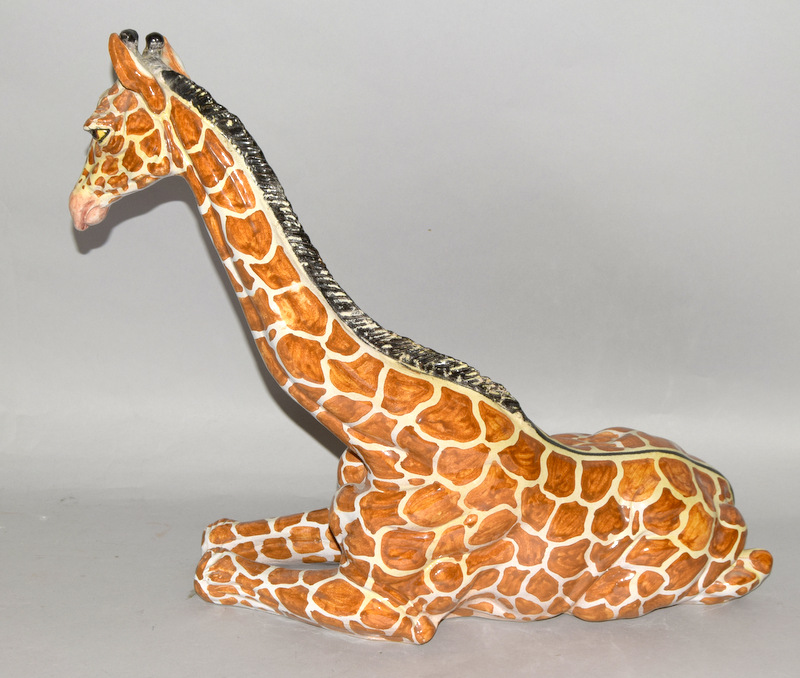 Large porcelain figure of a giraffe. 43cm x 47cm