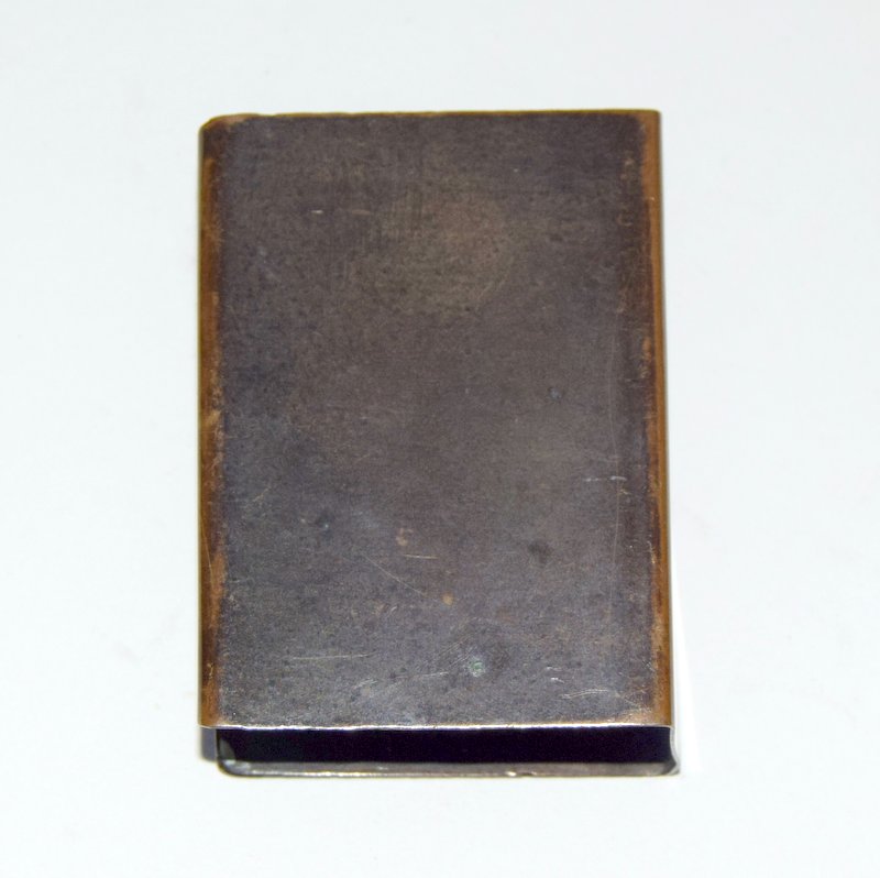 A WW1 brass matchbox cover having in raised relief Farewell from the ...