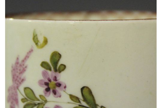 A Lowestoft porcelain coffee cup, circa 1775, painted with polychrome ...