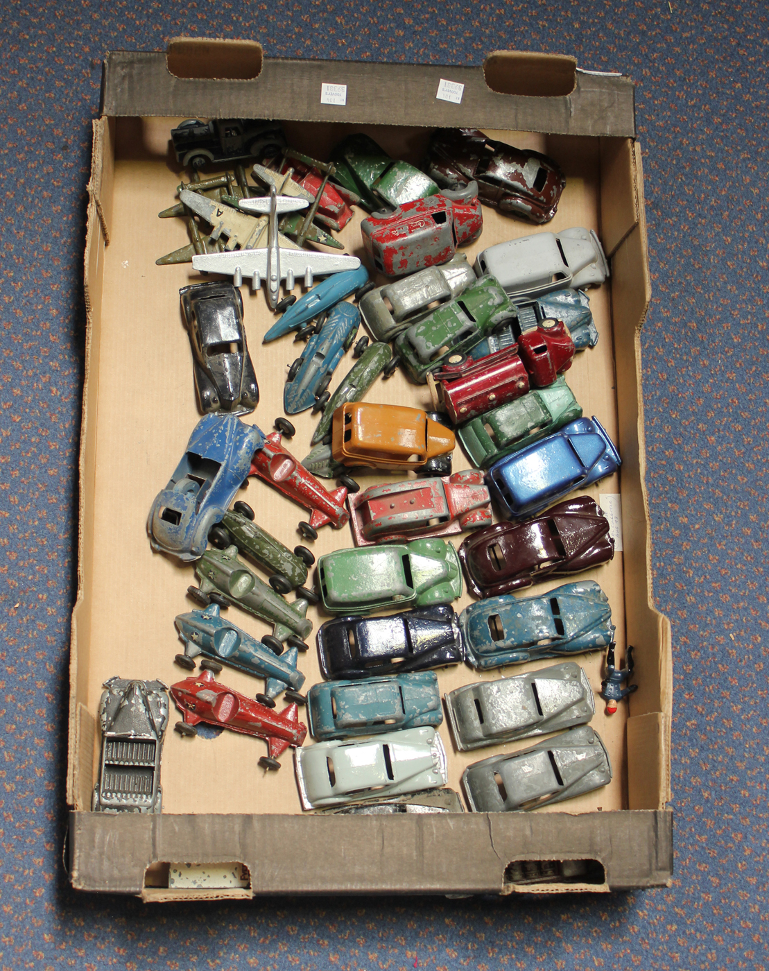 A collection of Timpo Toys die-cast cars, racing cars, commercial ...