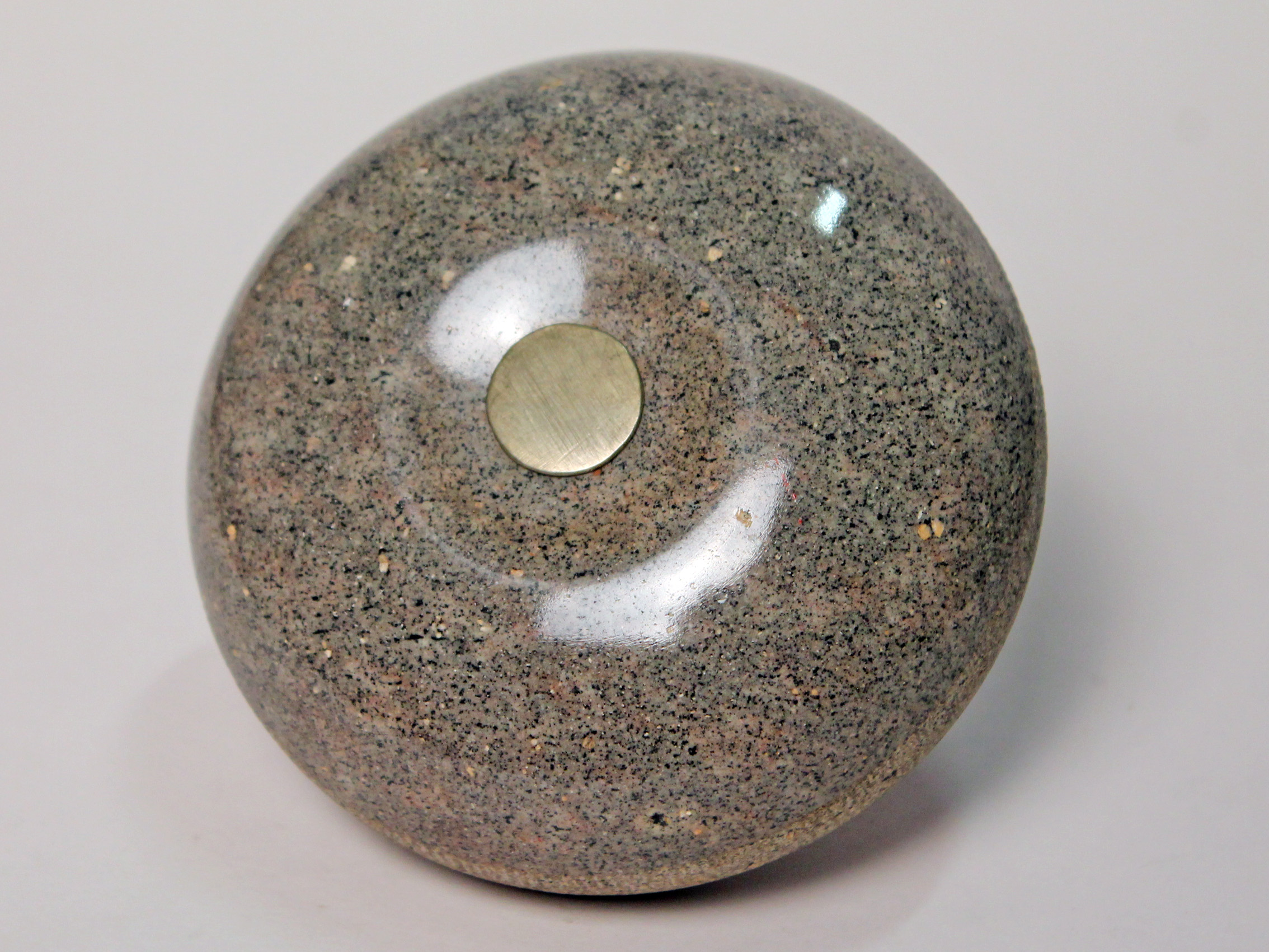 A novelty miniature curling stone paperweight, diam. 10cm. Condition ...