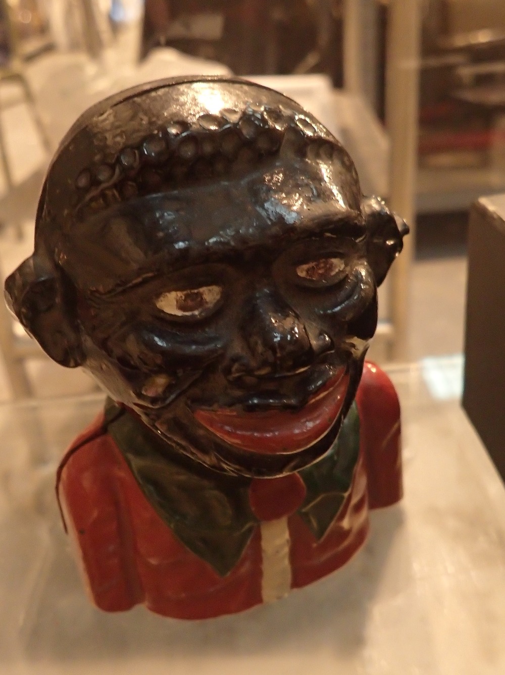 Small cast iron black man money box with slot in back of head