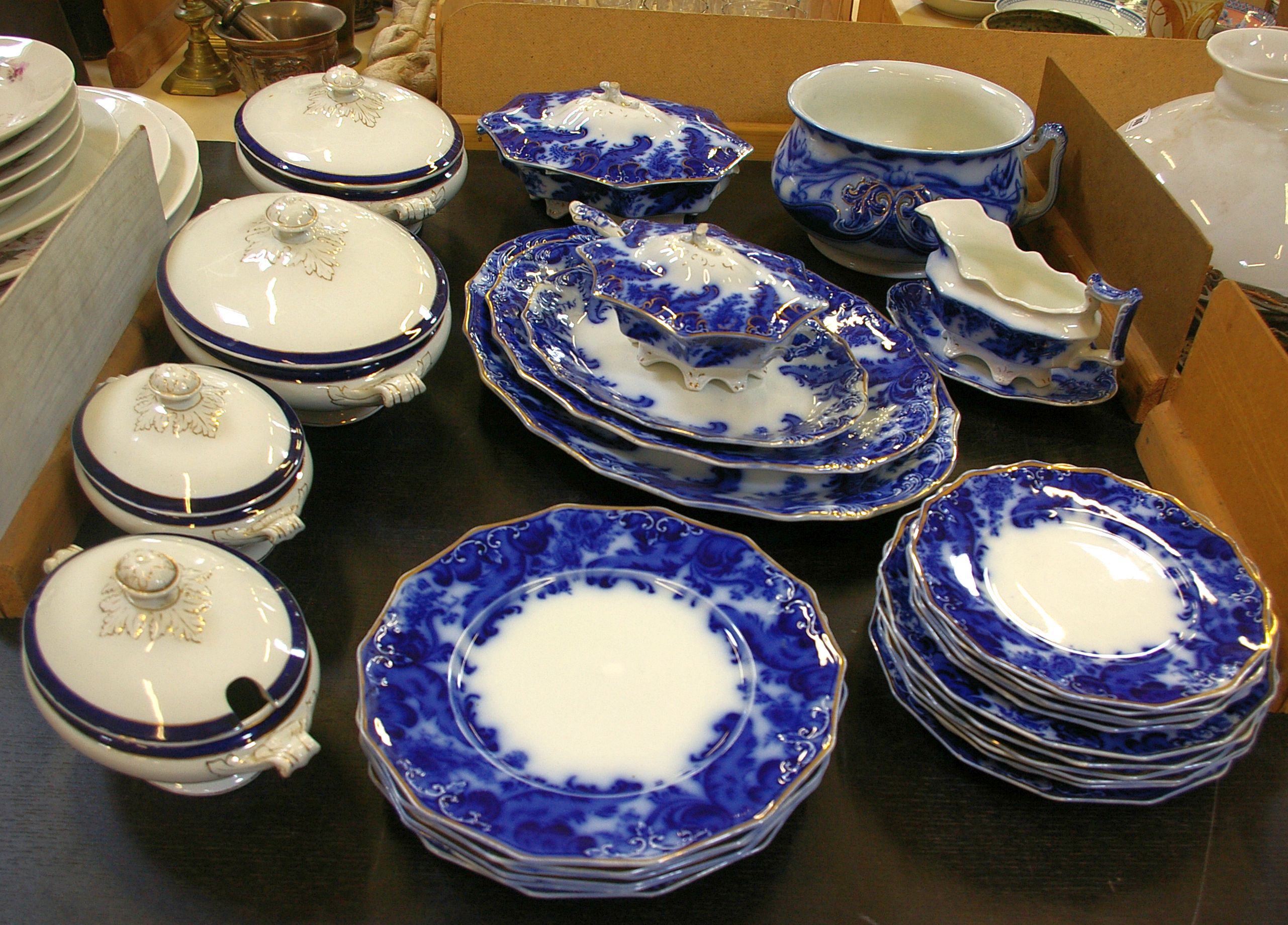 A part late Victorian blue and white dinner service including, two ...